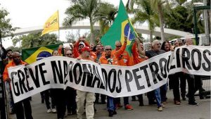 Oil workers go on indefinite strike against mass layoffs and ...