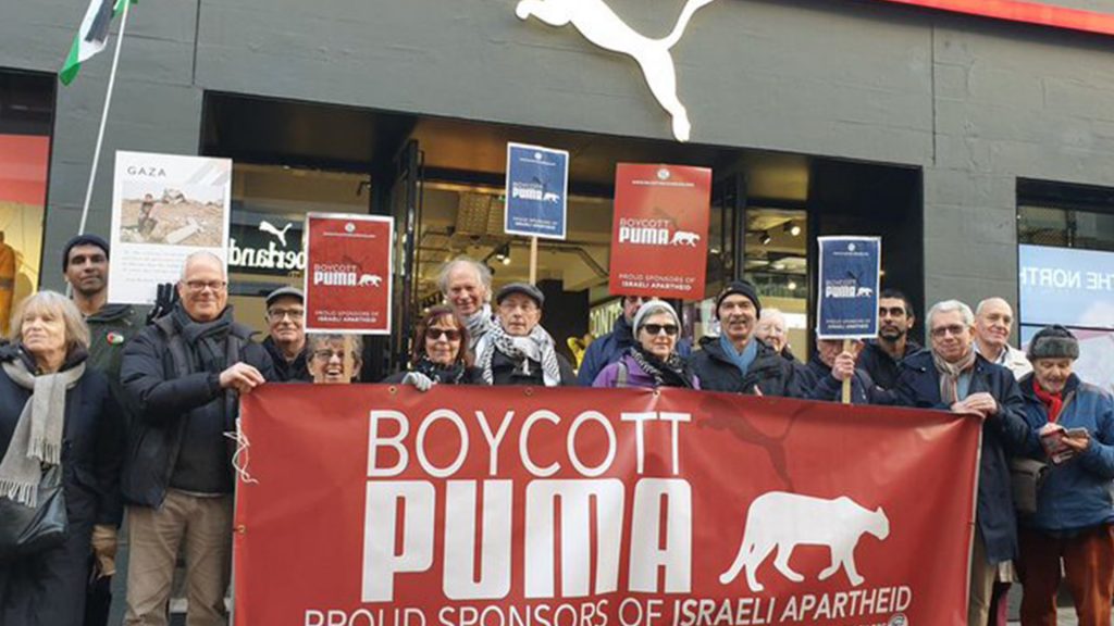 #BoycottPuma: Protest in London calls for end to company support for ...