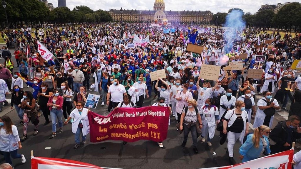 French health workers hit the streets, demand that government save ...